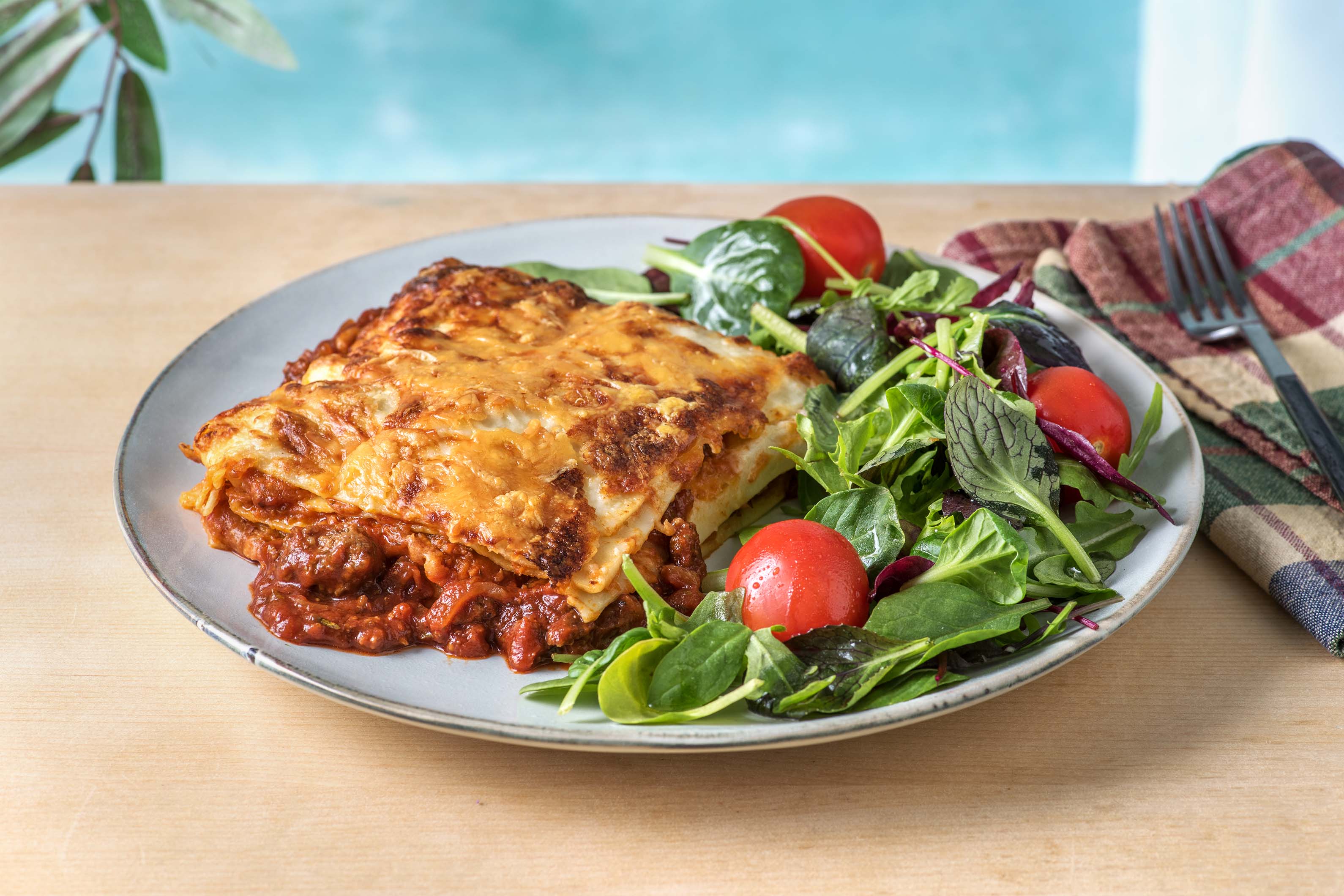 Lasagne bolognese met frisse salade Recept | HelloFresh