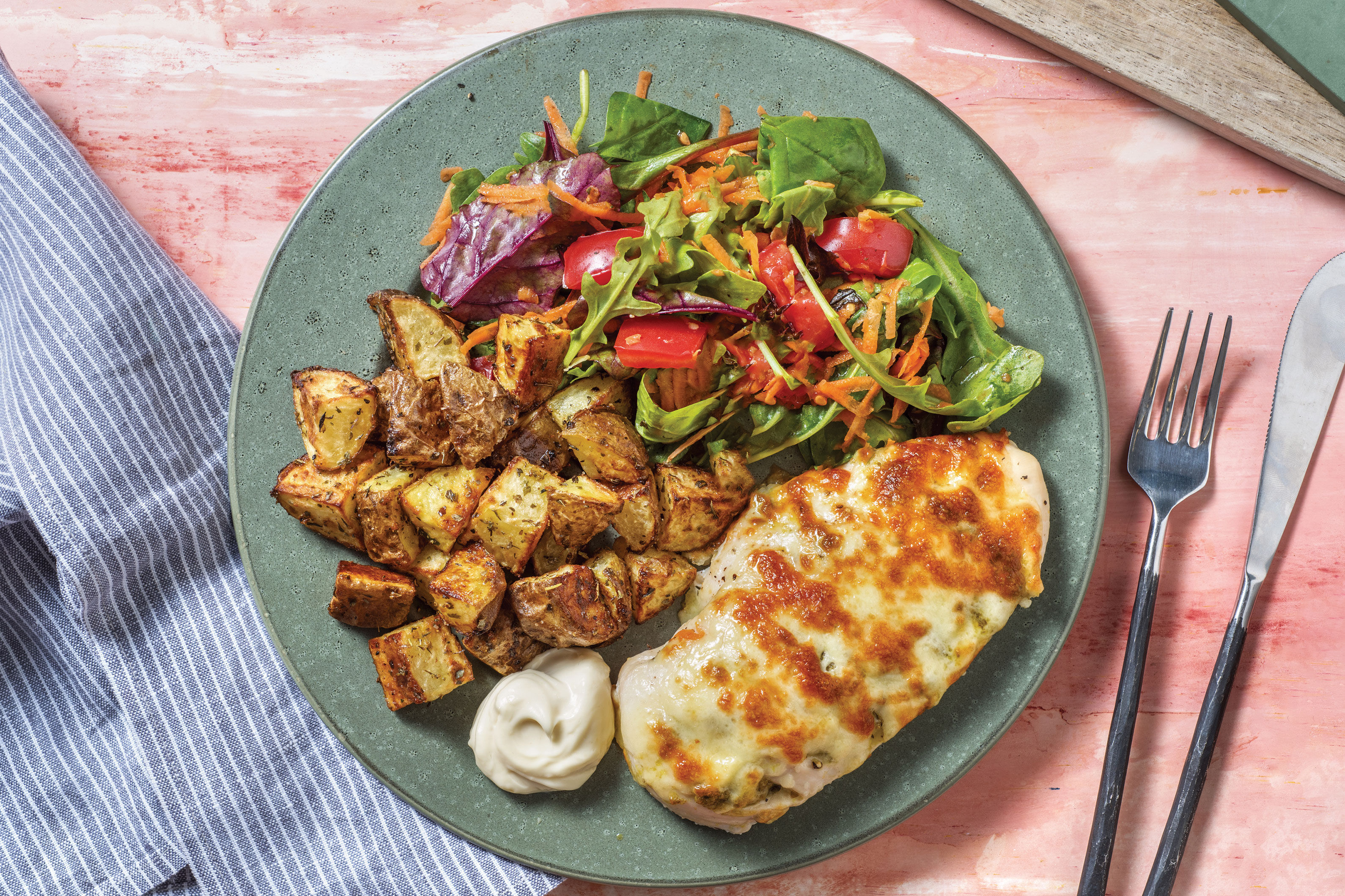 Cheesy Pesto Hasselback Chicken with Garlic-Herb Potatoes & Garden ...