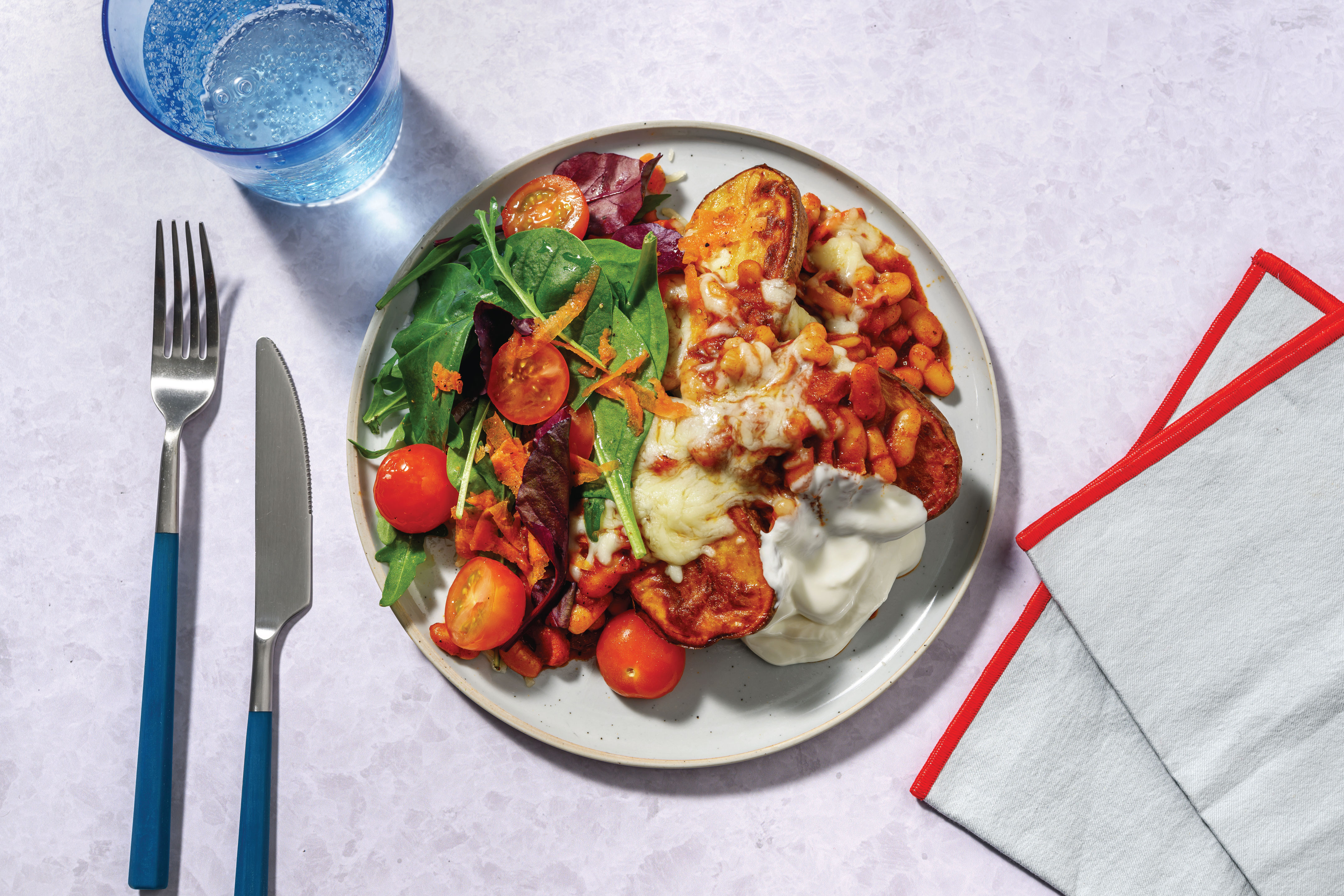 Cheat's Loaded Pork & Veggie Jacket Potatoes Recipe | HelloFresh