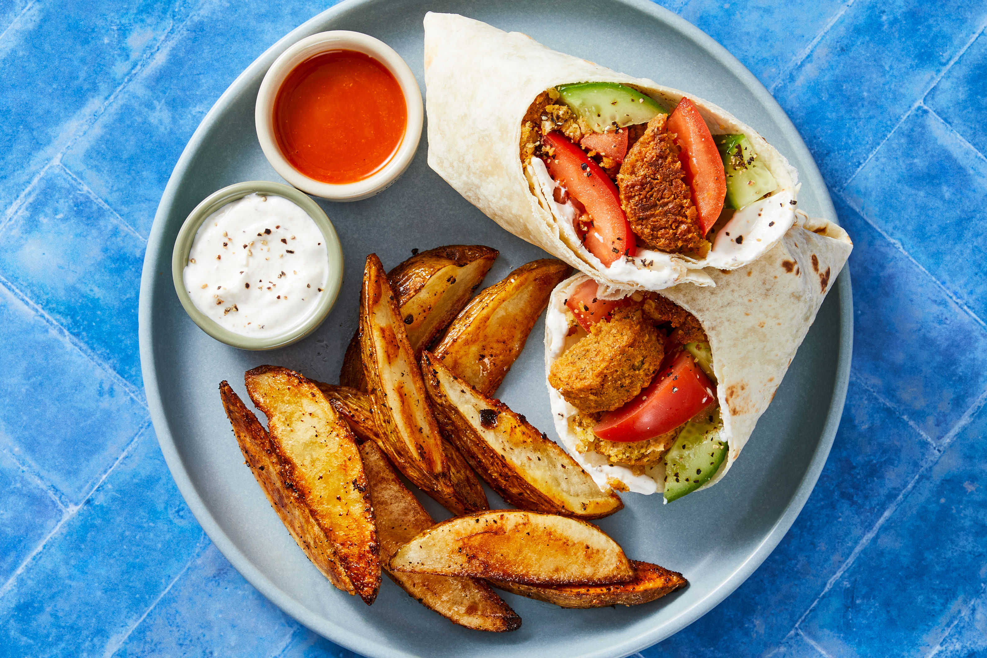 Falafel Wrap with Cucumber Tomato Salad Recipe | HelloFresh