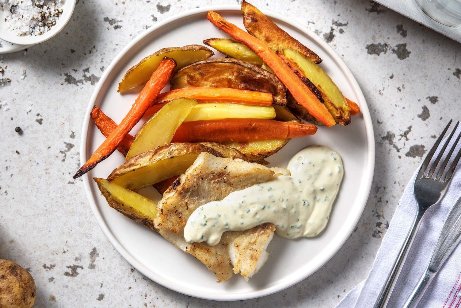 Schelvisfilet met bieslooksaus Recept | HelloFresh