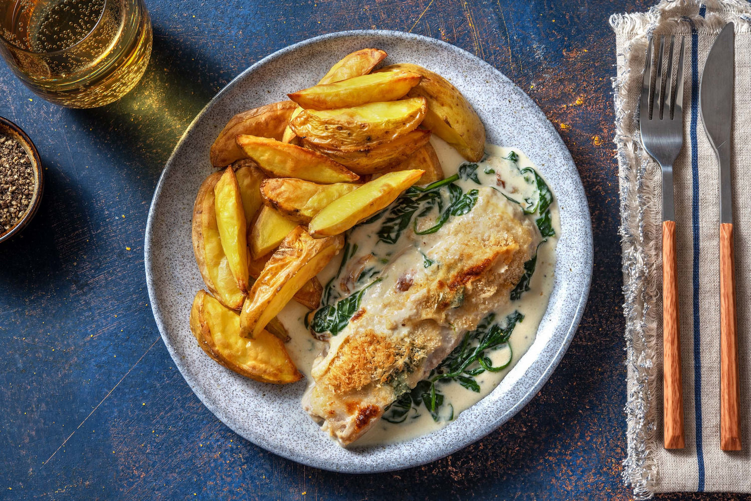 Seehecht in Spinat-Sahne-Soße aus dem Ofen Rezept | HelloFresh