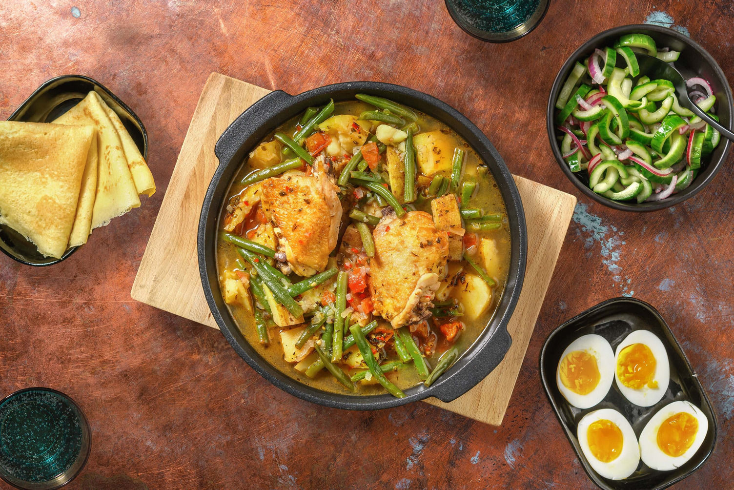 Roti met pittige kippendij en aardappel Recept | HelloFresh