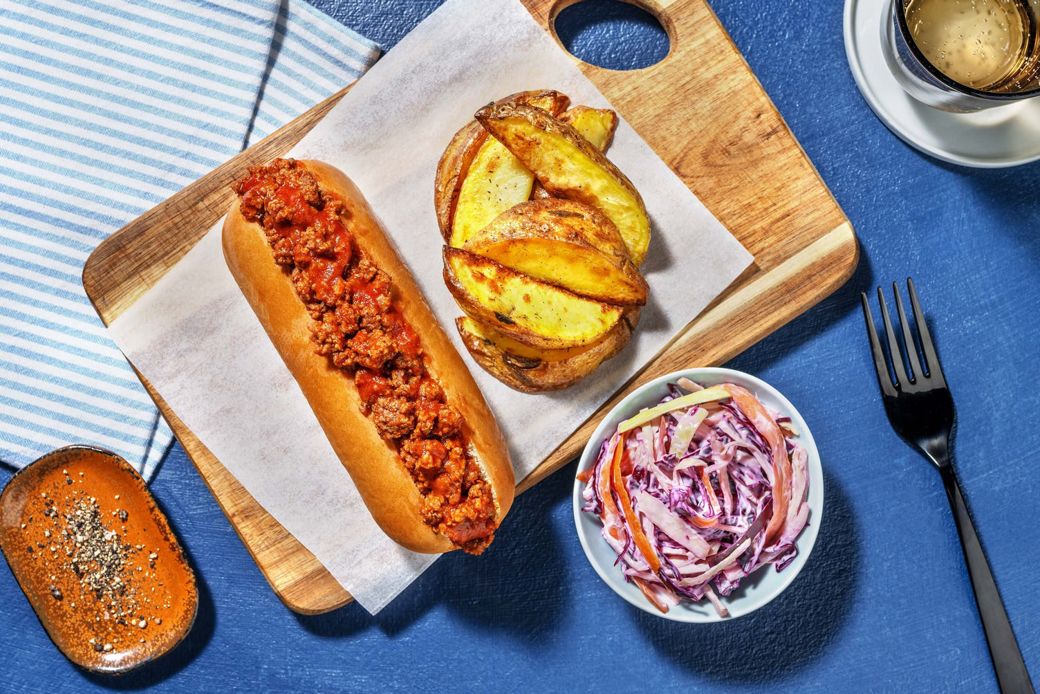 Chipotle Beef Chilli in a Bun and Wedges Recipe | HelloFresh