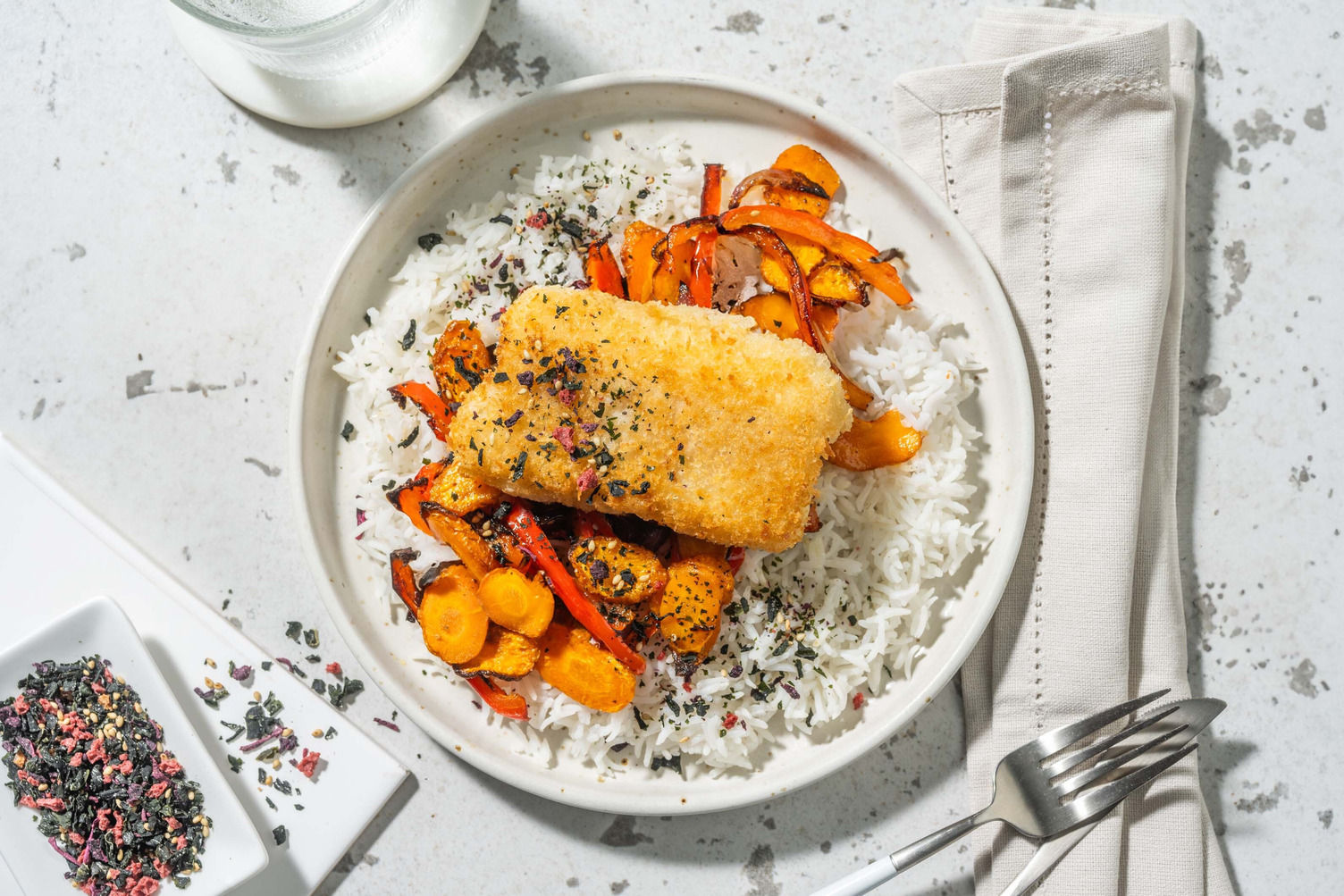 Gepaneerde kabeljauw met geroosterde groenten Recept | HelloFresh