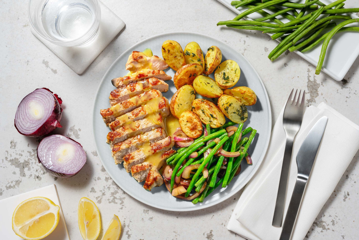 Varkensoester met frisse citroendressing Recept | HelloFresh