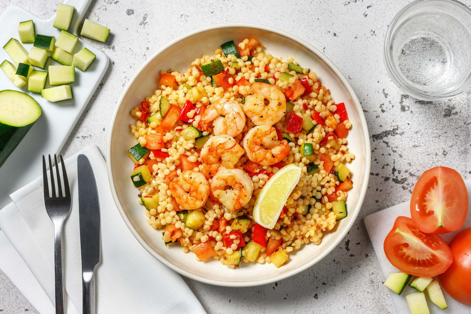 Parelcouscous met garnalen en courgette Recept | HelloFresh