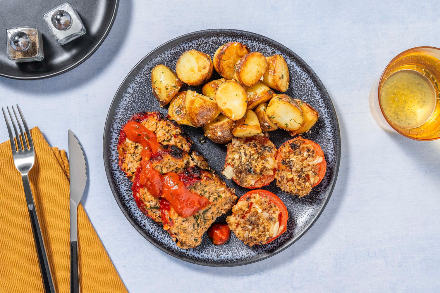 Pain de viande aux saveurs du sud et tomates rôties Recette | HelloFresh