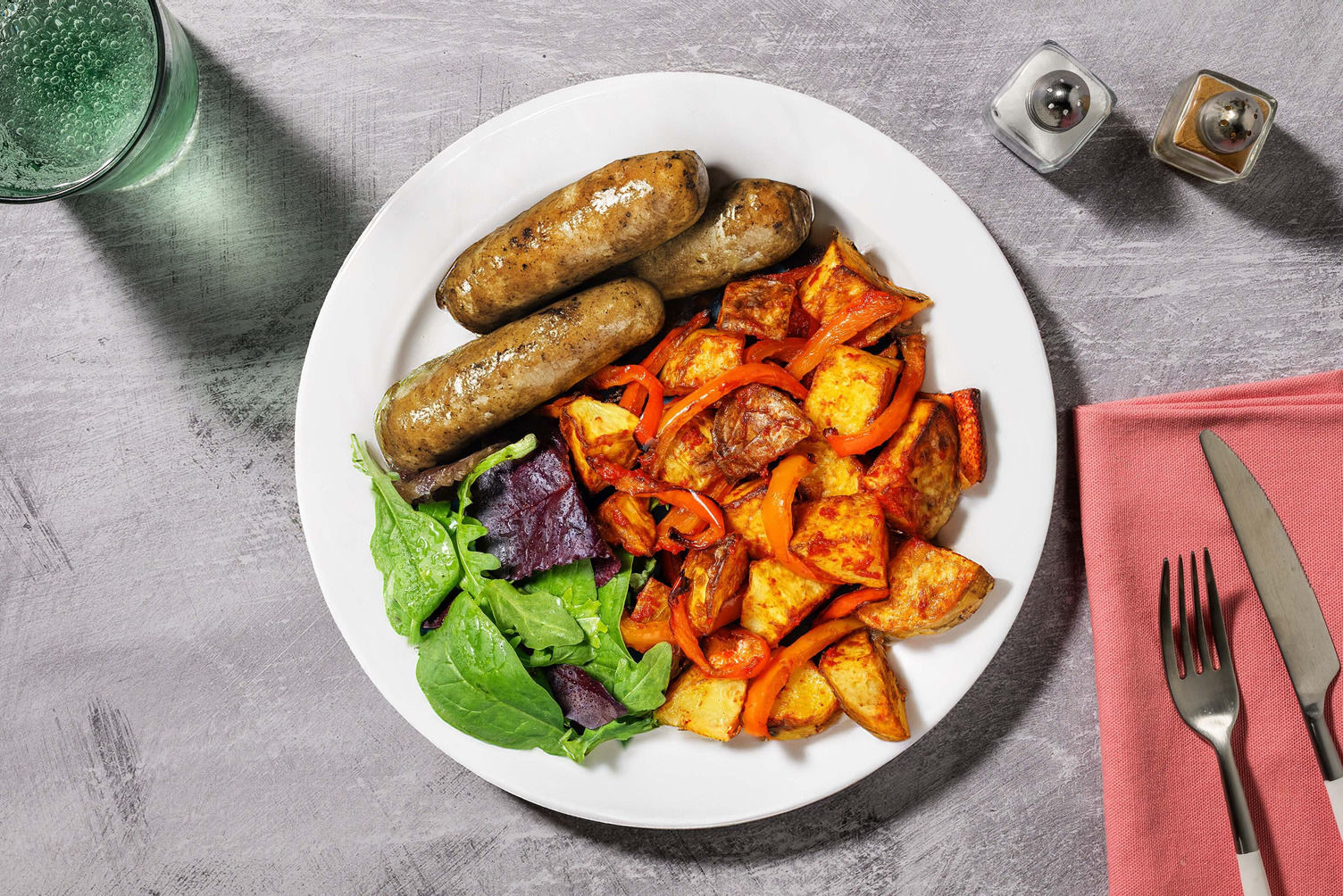 Chipotle THIS™ Isn't Pork Sausage Fajita Traybake Recipe | HelloFresh