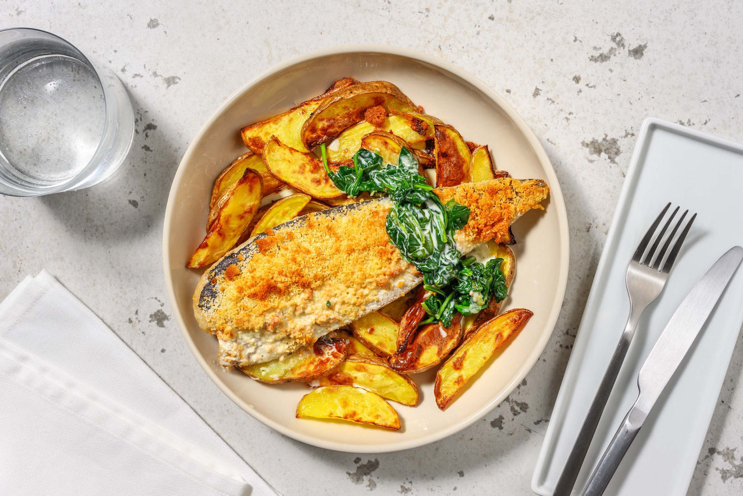 Seehecht in Spinat-Sahne-Soße aus dem Ofen Rezept | HelloFresh