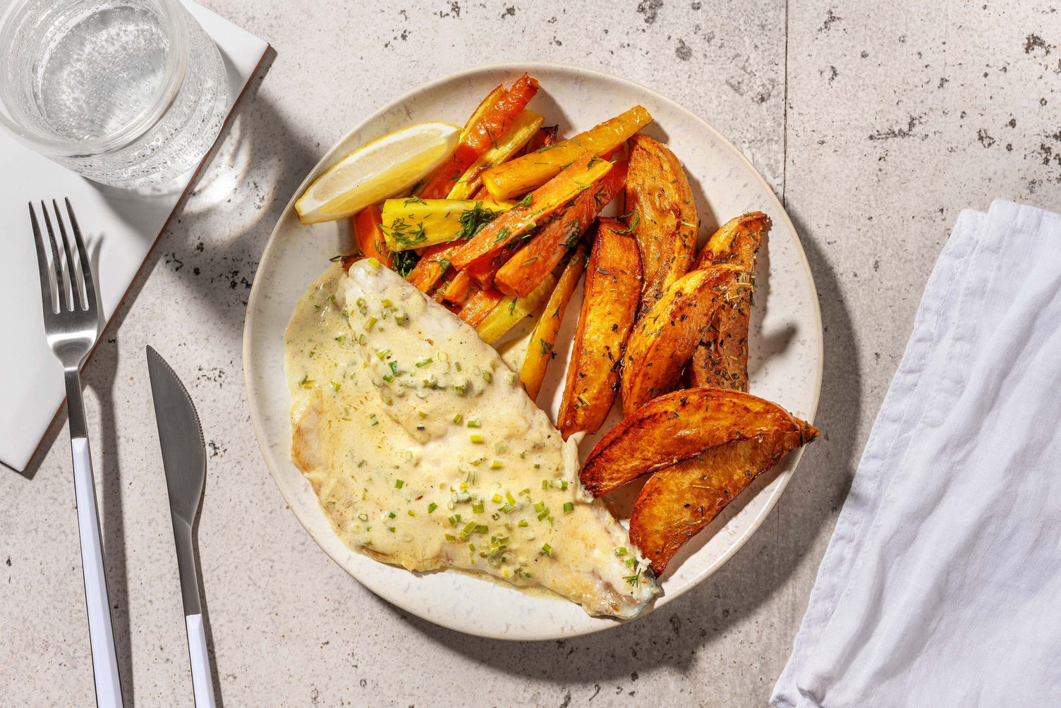 Koolvis met romige bieslooksaus Recept | HelloFresh