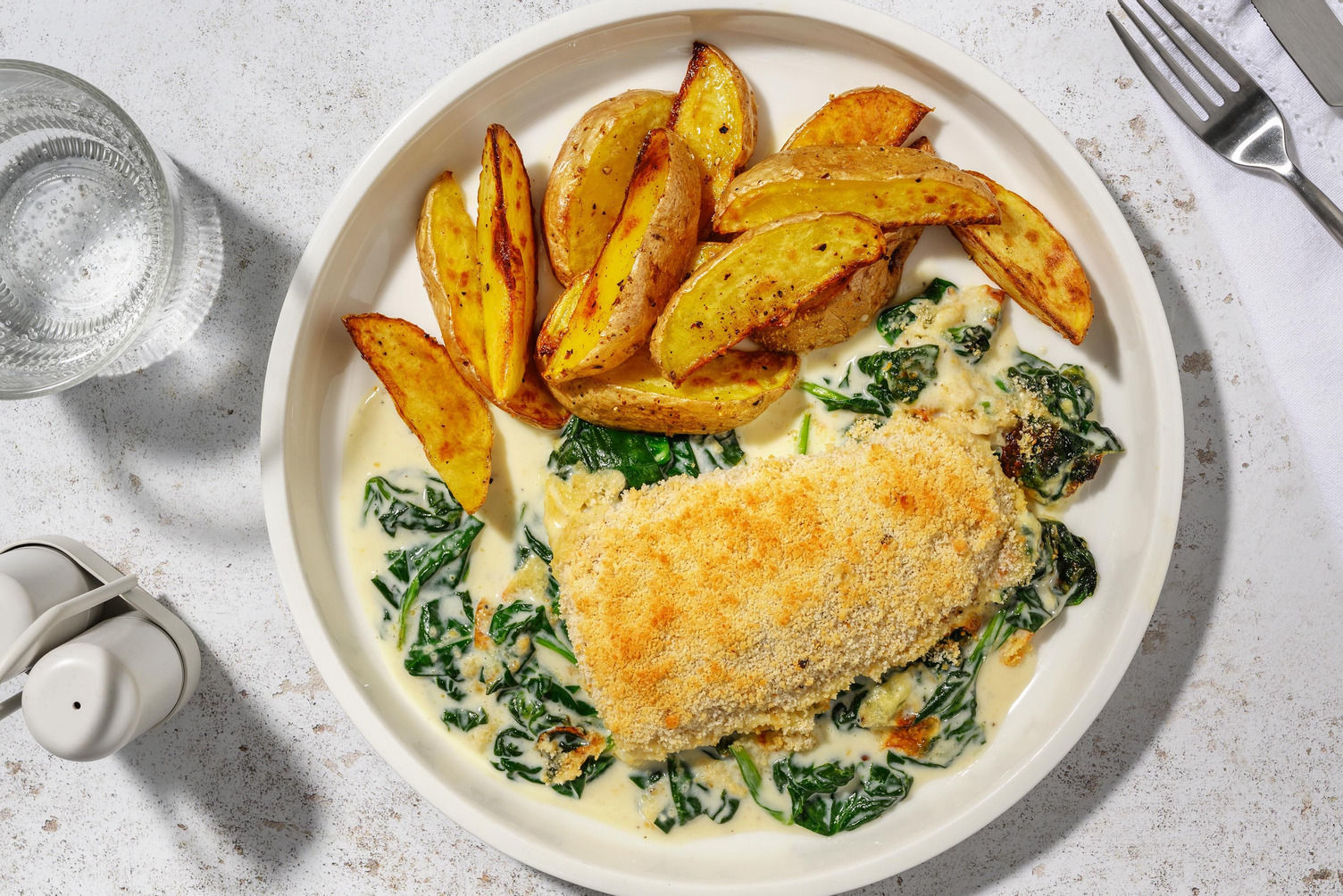 Seehecht in Spinat-Sahne-Soße aus dem Ofen Rezept | HelloFresh