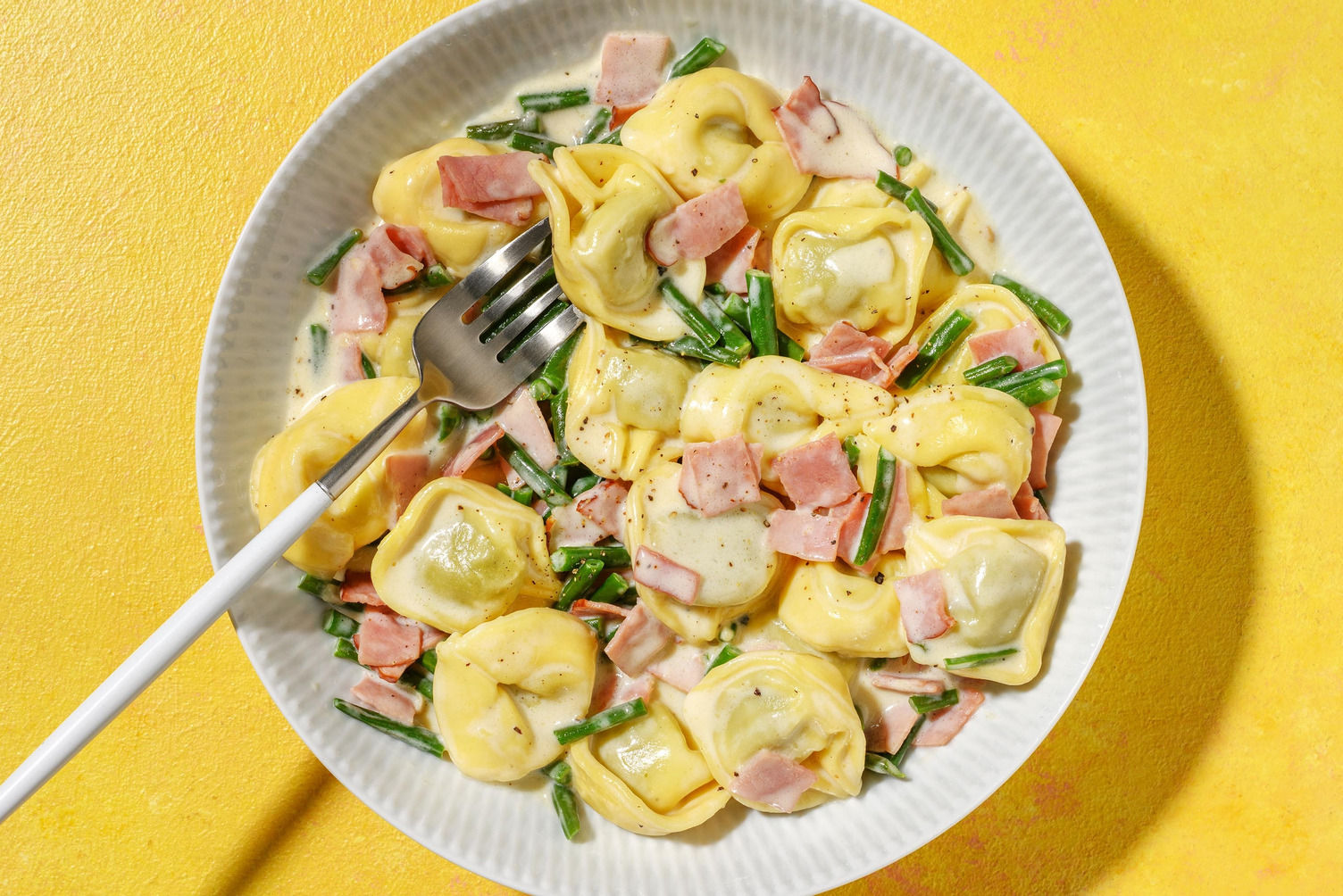 Spinat-Ricotta-Tortellini mit Prosciutto Rezept | HelloFresh
