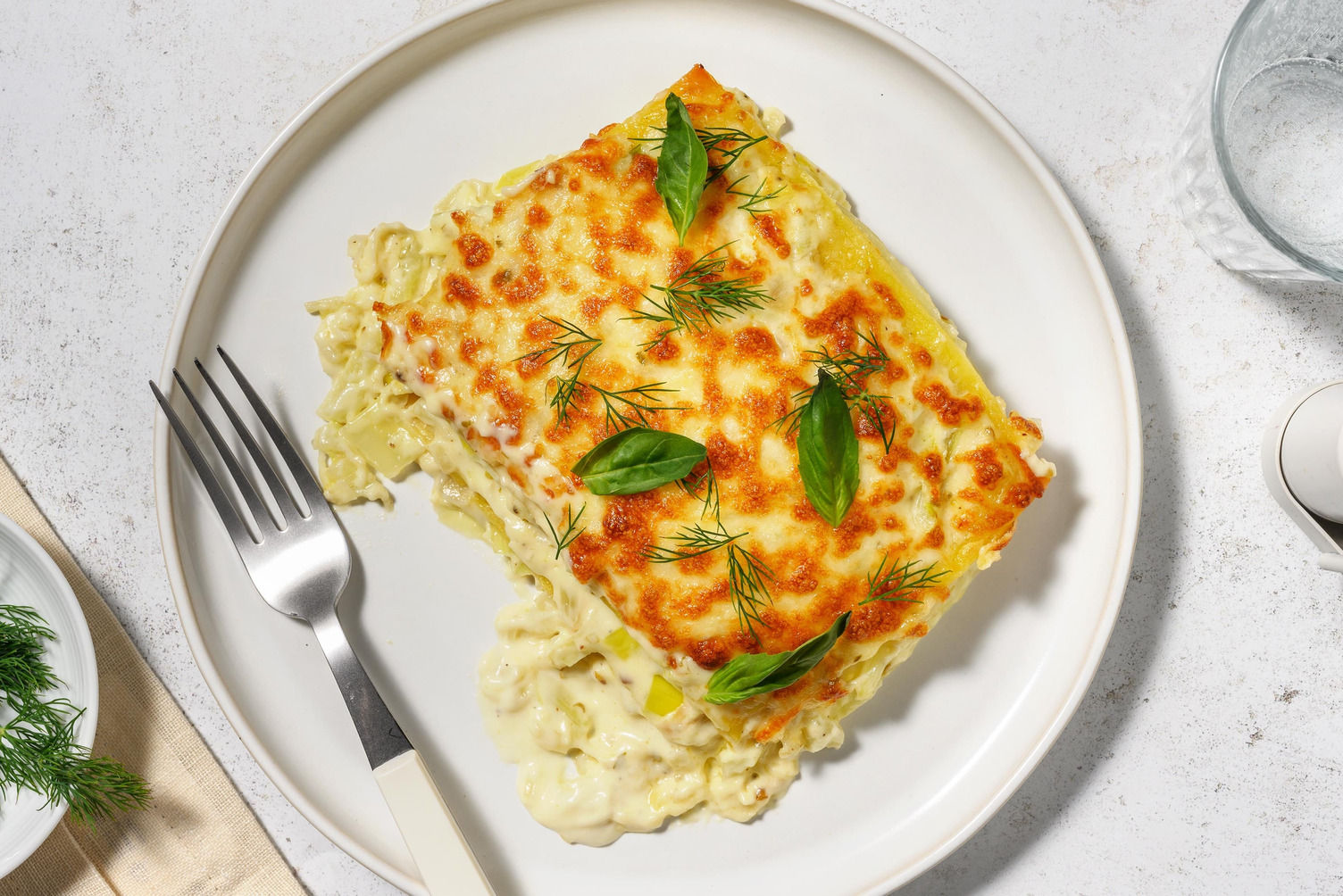 Romige lasagne met venkel en prei Recept | HelloFresh
