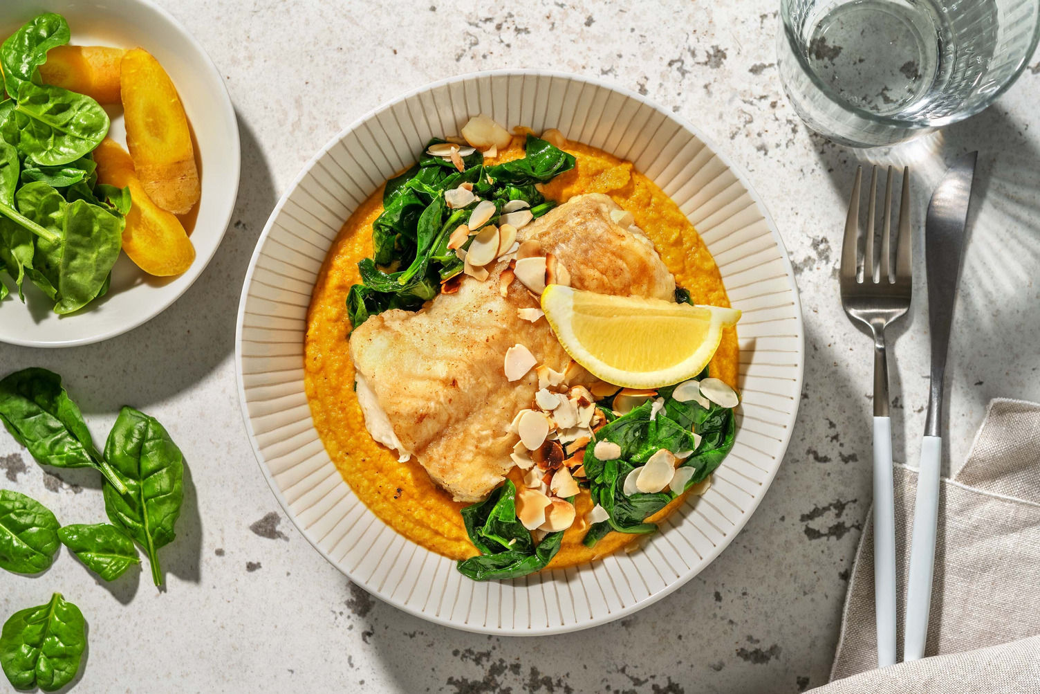 Schelvis à la meunière met spinazie Recept | HelloFresh