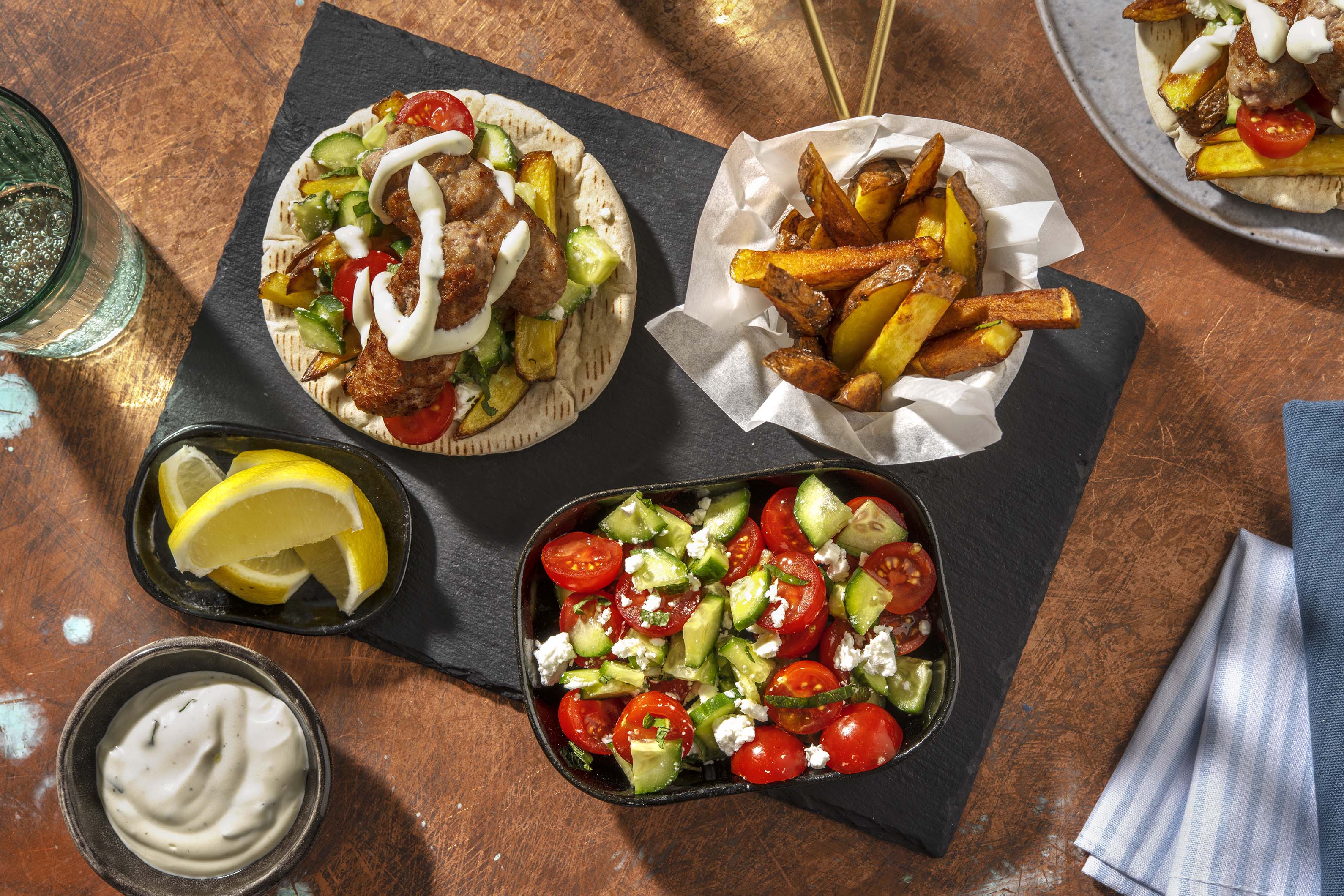 Greek Inspired Herby Pork Kofta Gyros | HelloFresh