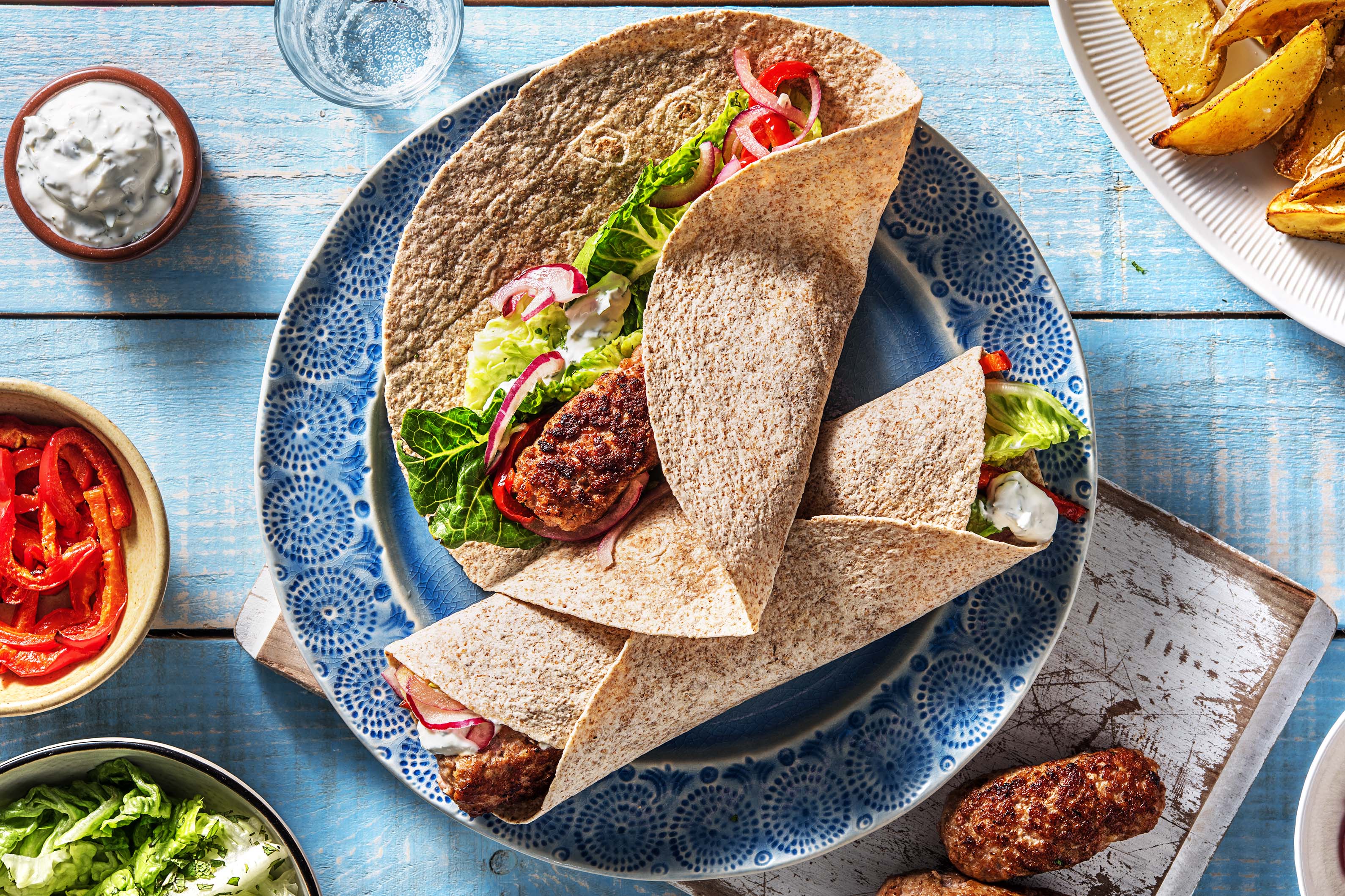 Wrap with Pork, Wedges and Onion Recipe | HelloFresh