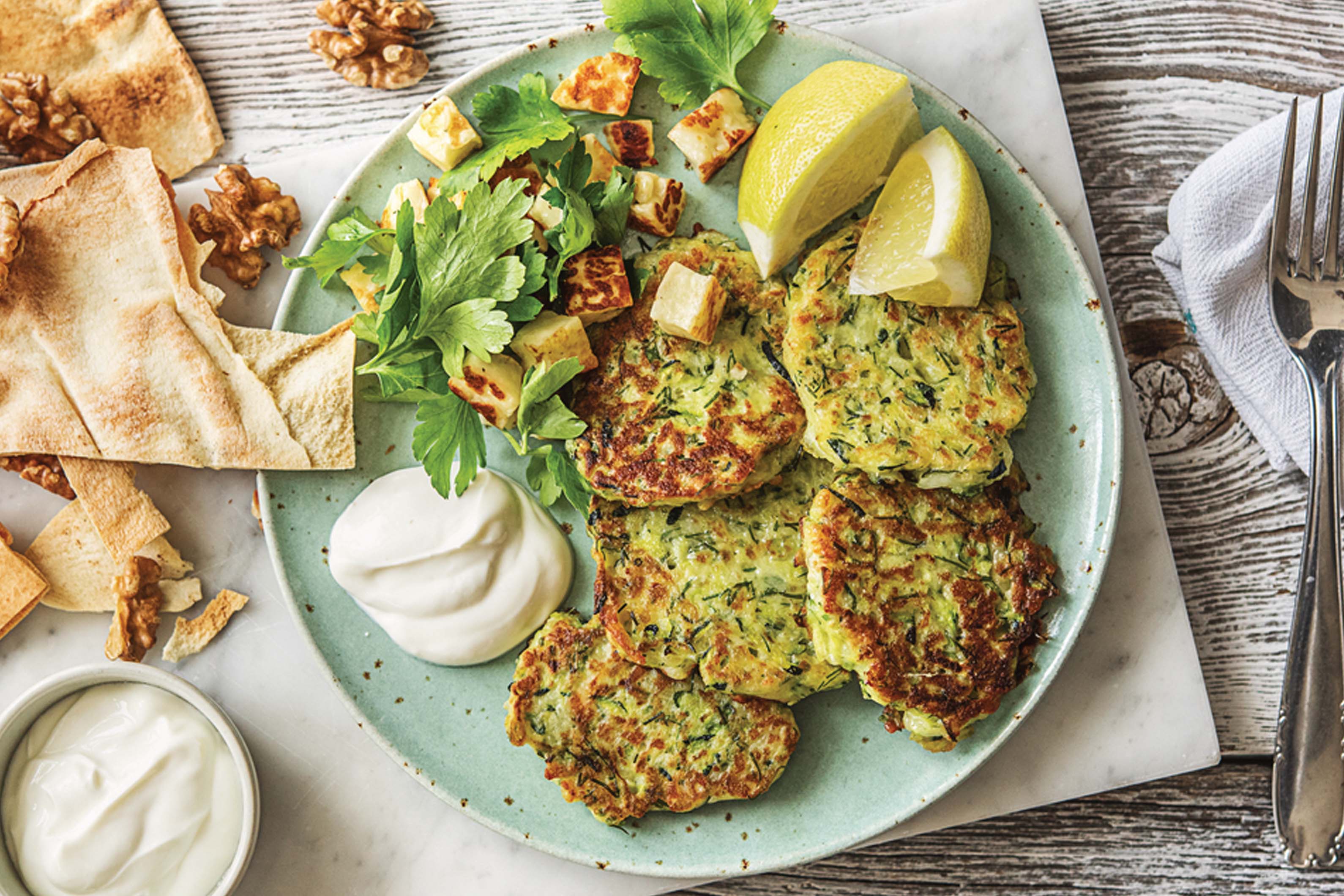 Haloumi & Zucchini Cakes with Lebanese Bread Crisps Recipe | HelloFresh