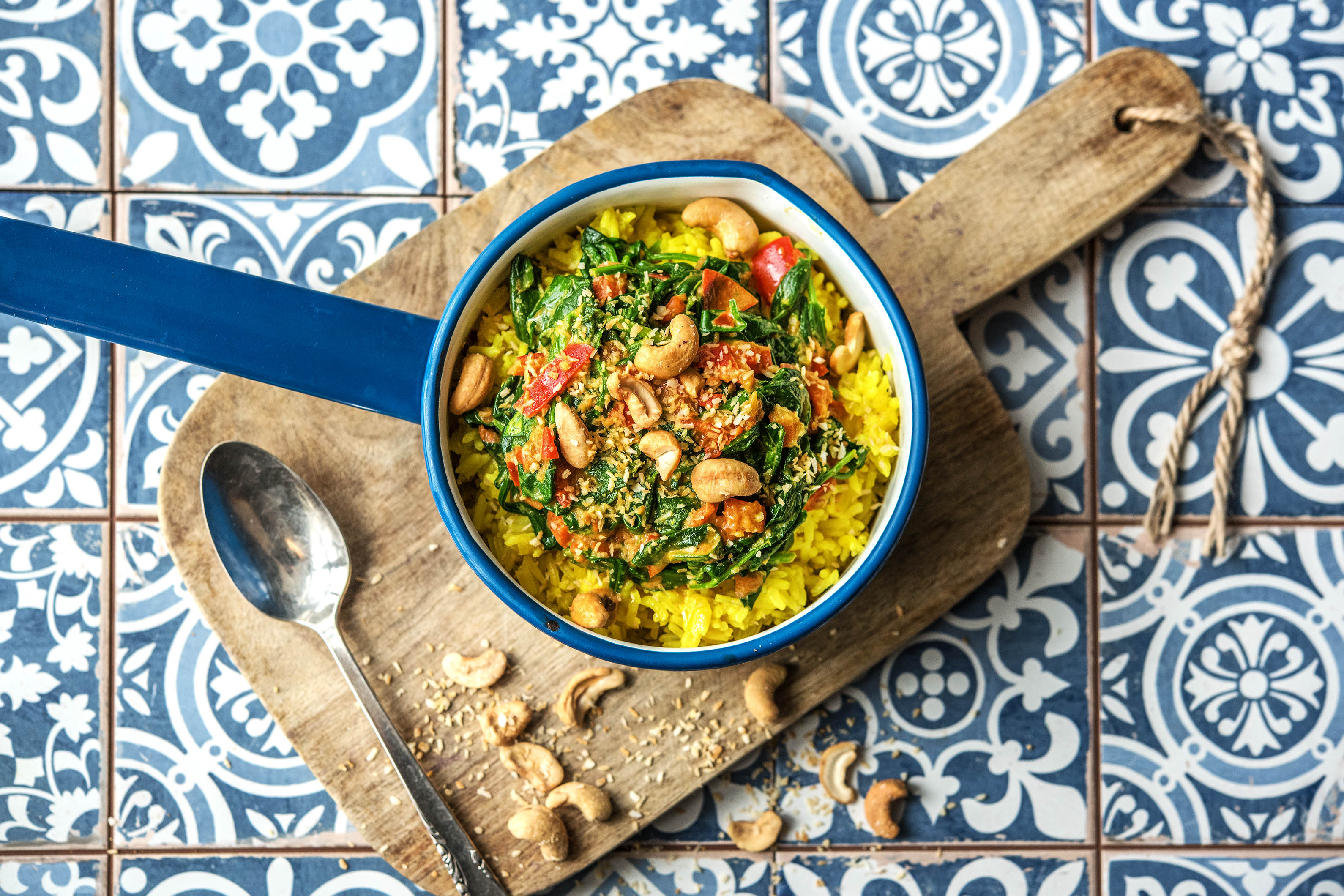 Gele rijst met spinazie-kokoscurry Recept | HelloFresh