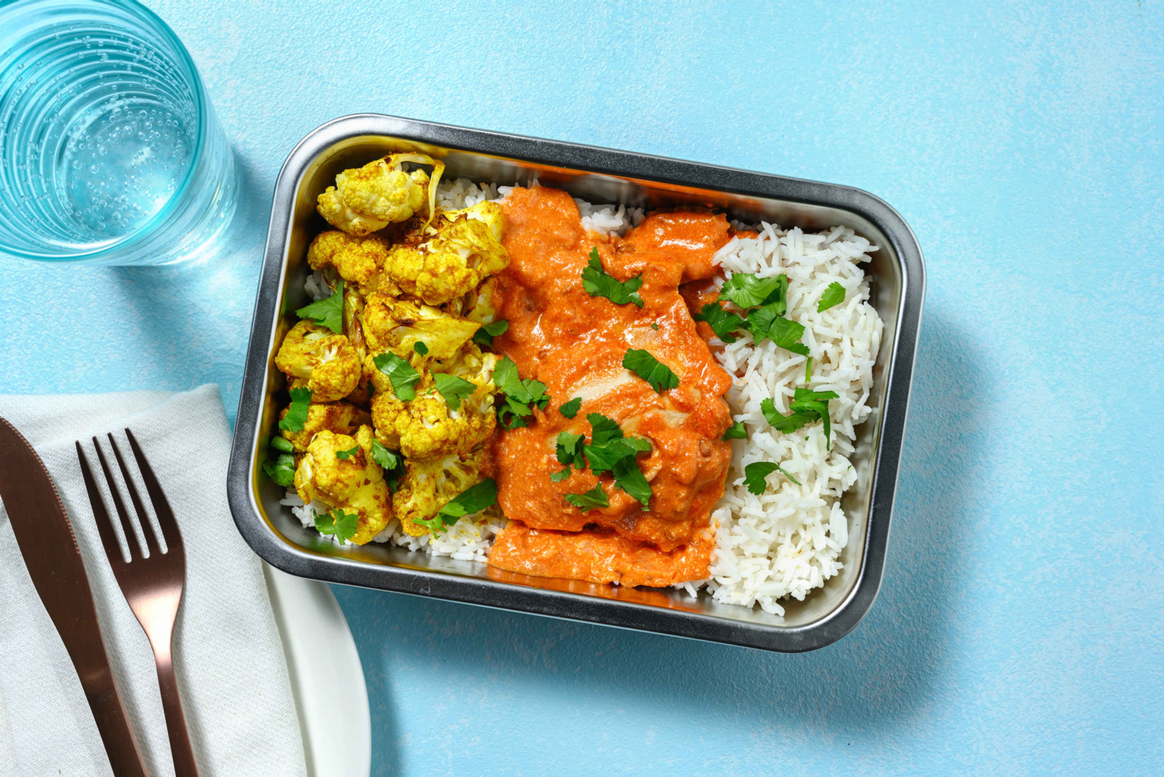 Indiase boterkip met geroosterde bloemkool en rijst Recept | HelloFresh