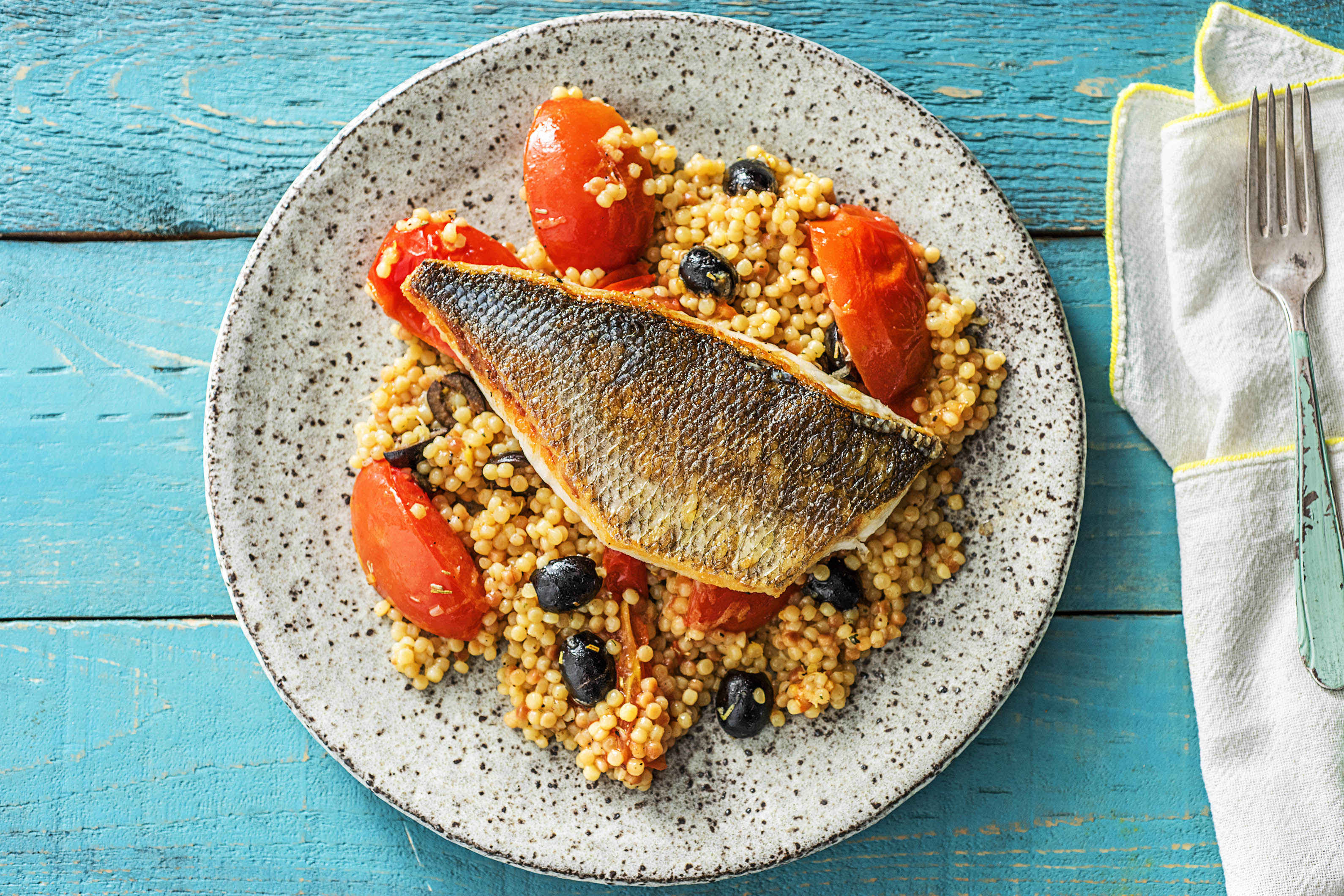 Gebakken zeebaars met parelcouscous Recept | HelloFresh