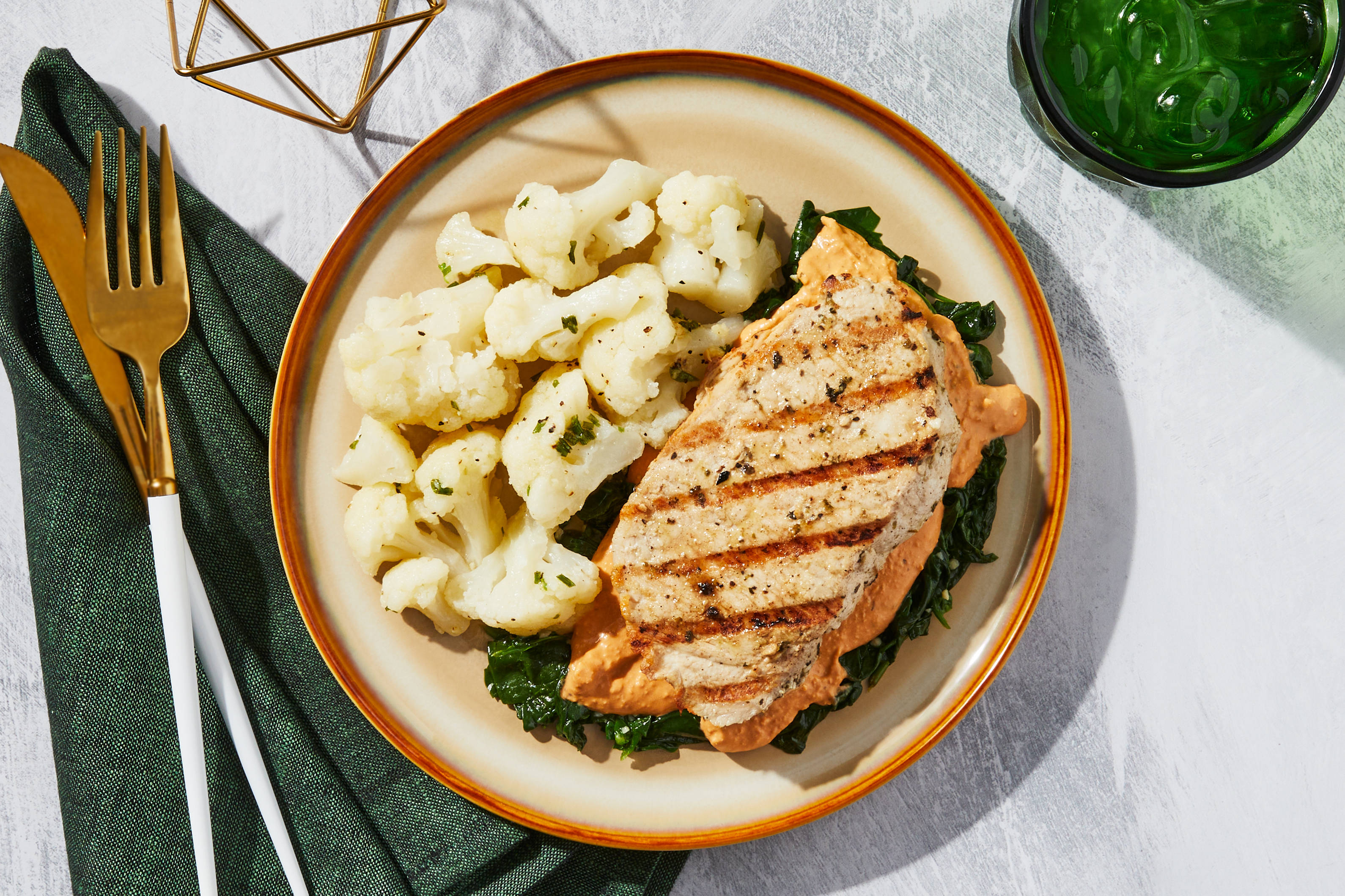 Creamy Tomato Pork Chop with Sautéed Spinach & Garlic-Chive Cauliflower ...