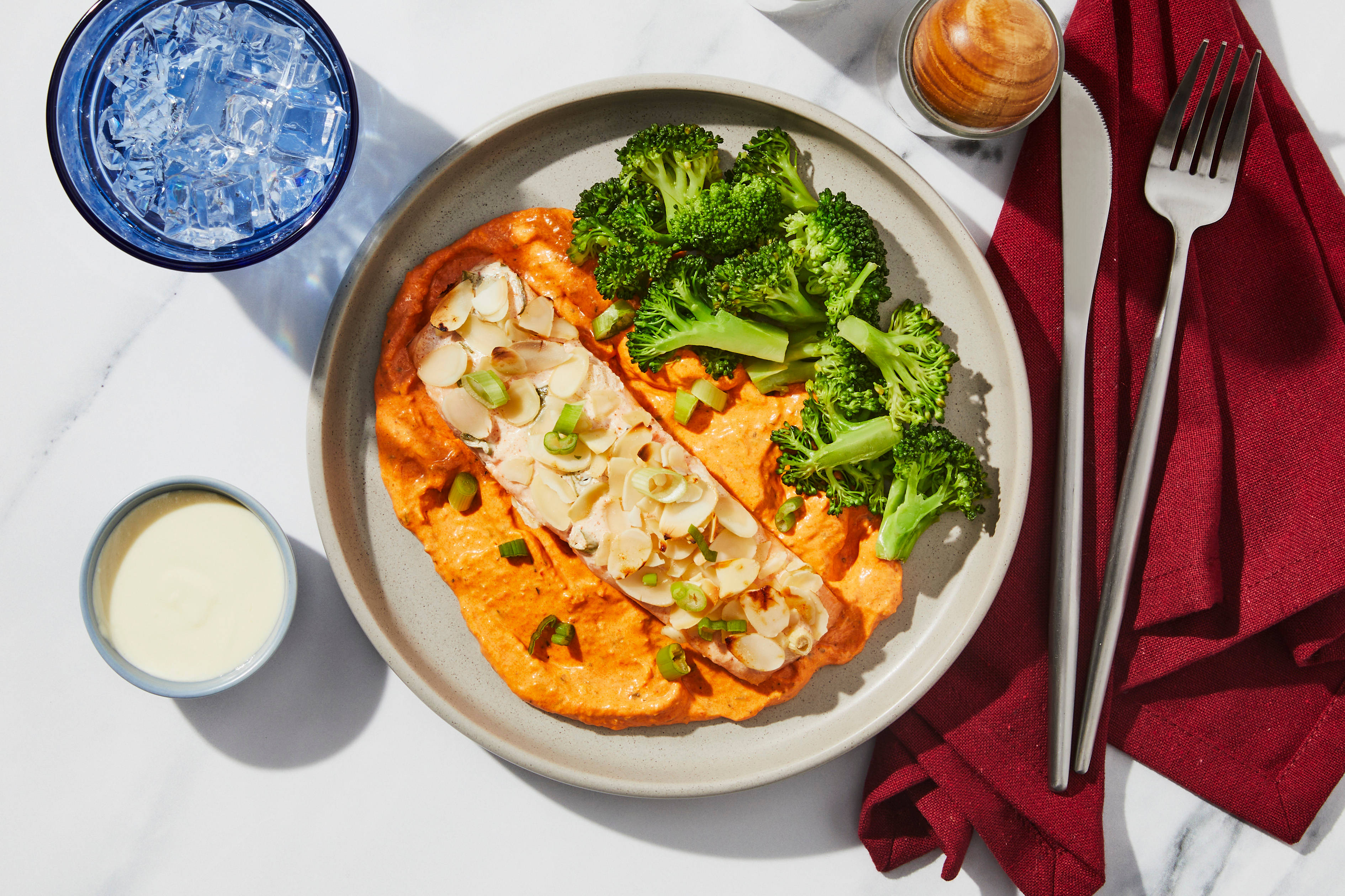 Almond Crusted Salmon with Red Pepper Cream, Broccoli & Feta Dressing ...