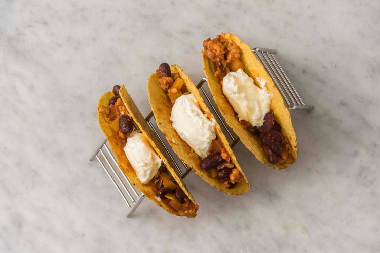 Crunchy taco's met rundergehakt en gebakken bonen Recept | HelloFresh